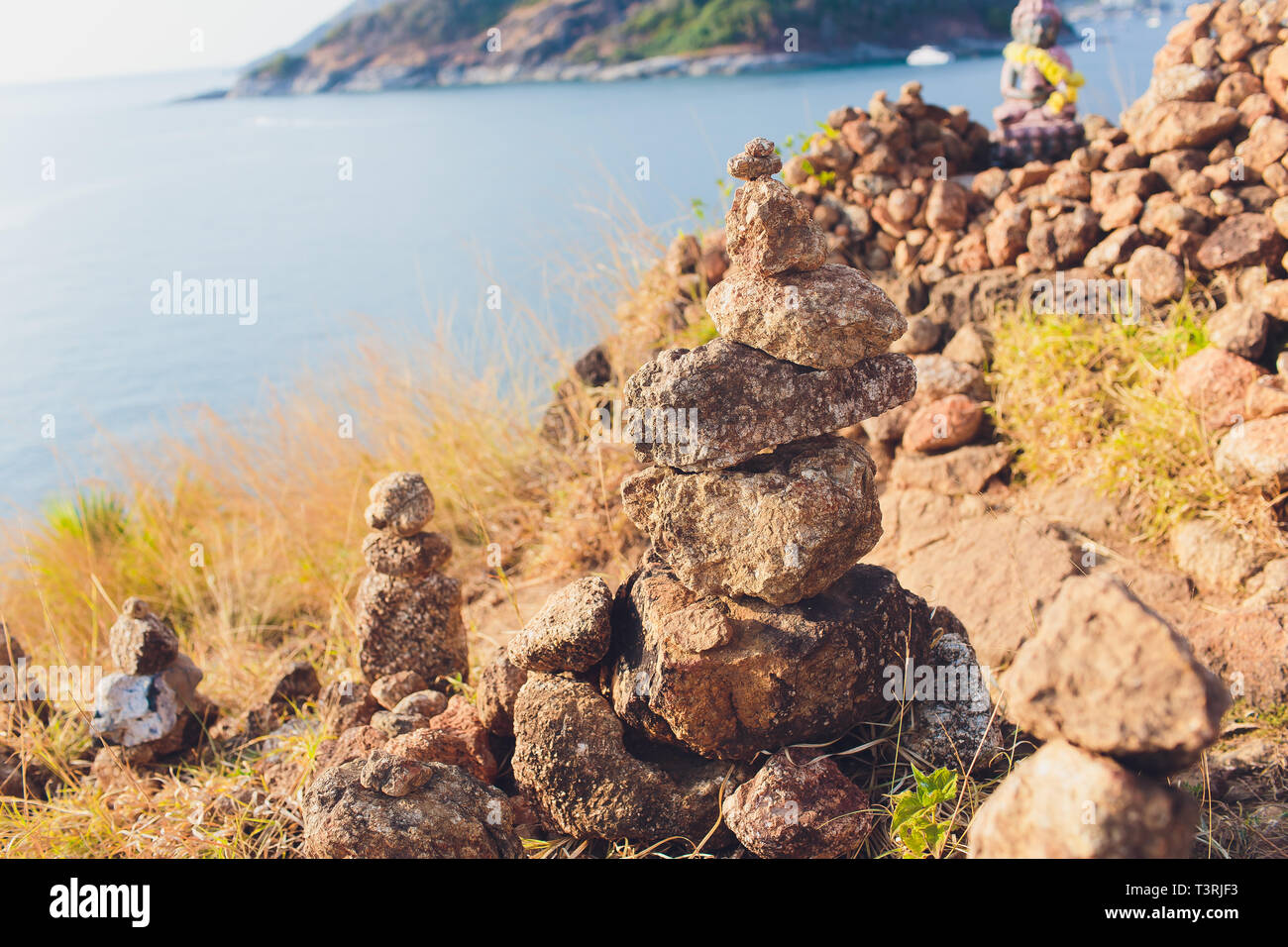 Stack tower stone zen art folded blurred rock background. large small ...