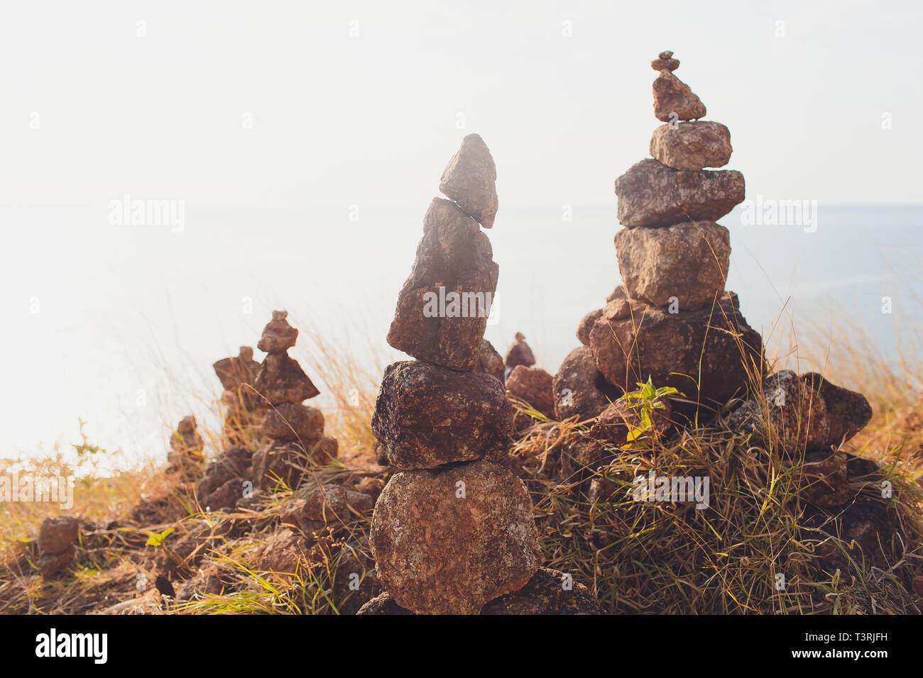 Stack tower stone zen art folded blurred rock background. large small ...