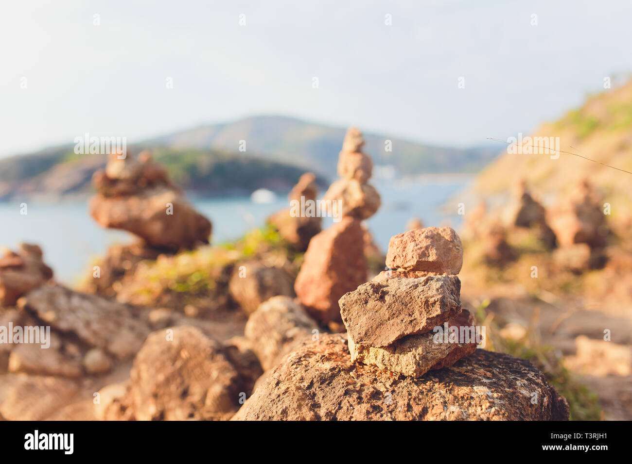 Stack tower stone zen art folded blurred rock background. large small ...