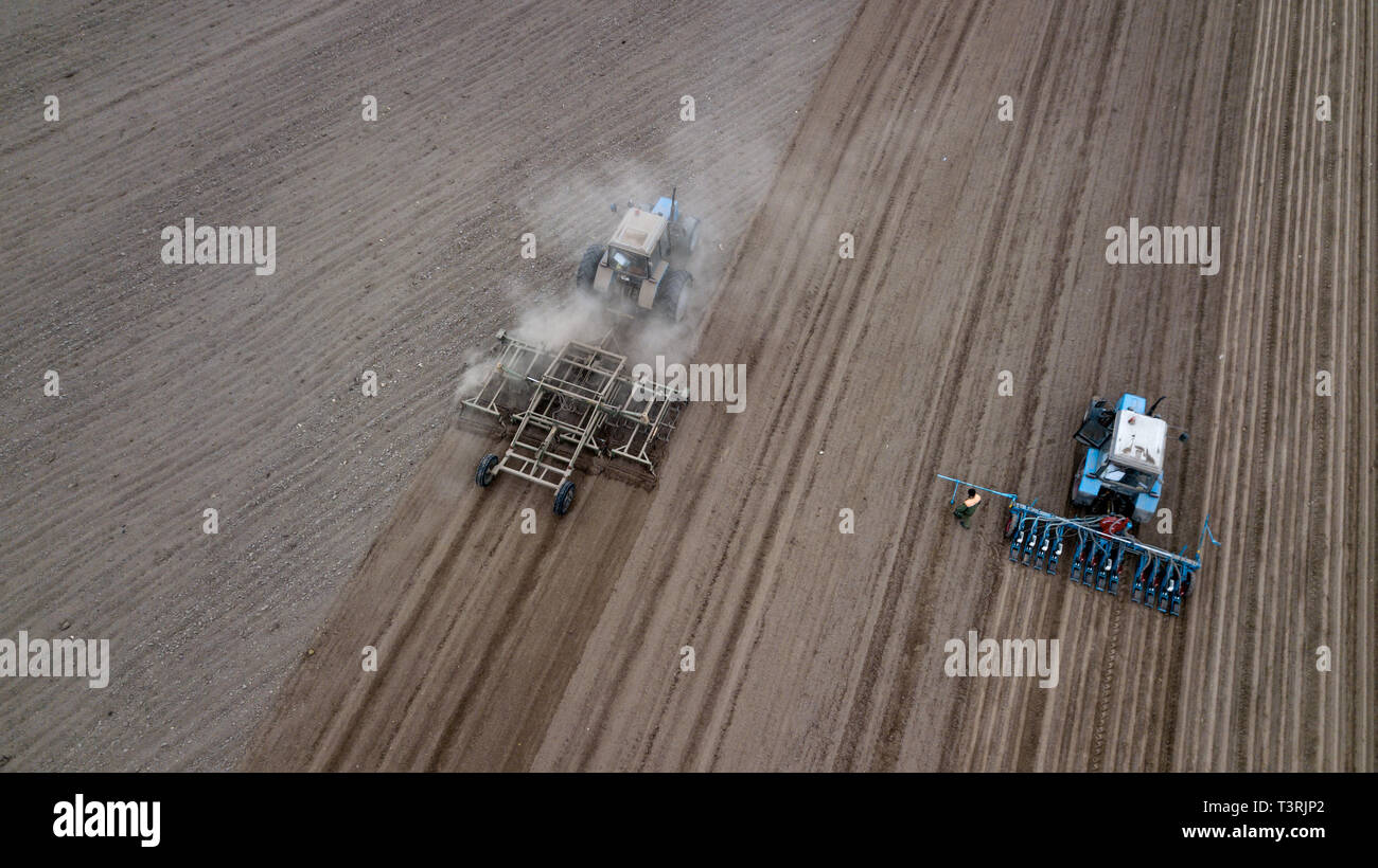 Aerial tractor in field plows hi-res stock photography and images - Alamy