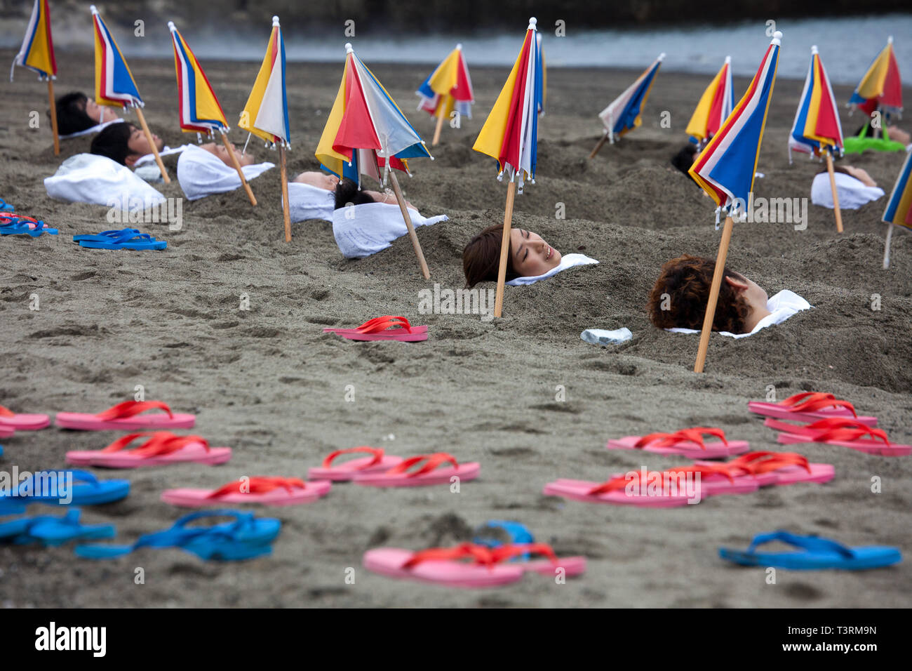 Woman buried in sand japan hi-res stock photography and images - Alamy