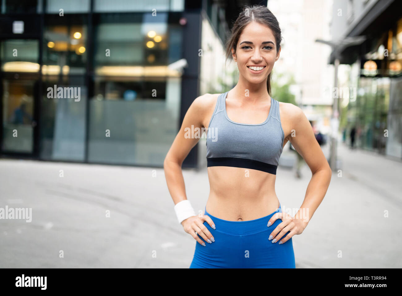 Picture of young attractive happy fitness woman Stock Photo - Alamy