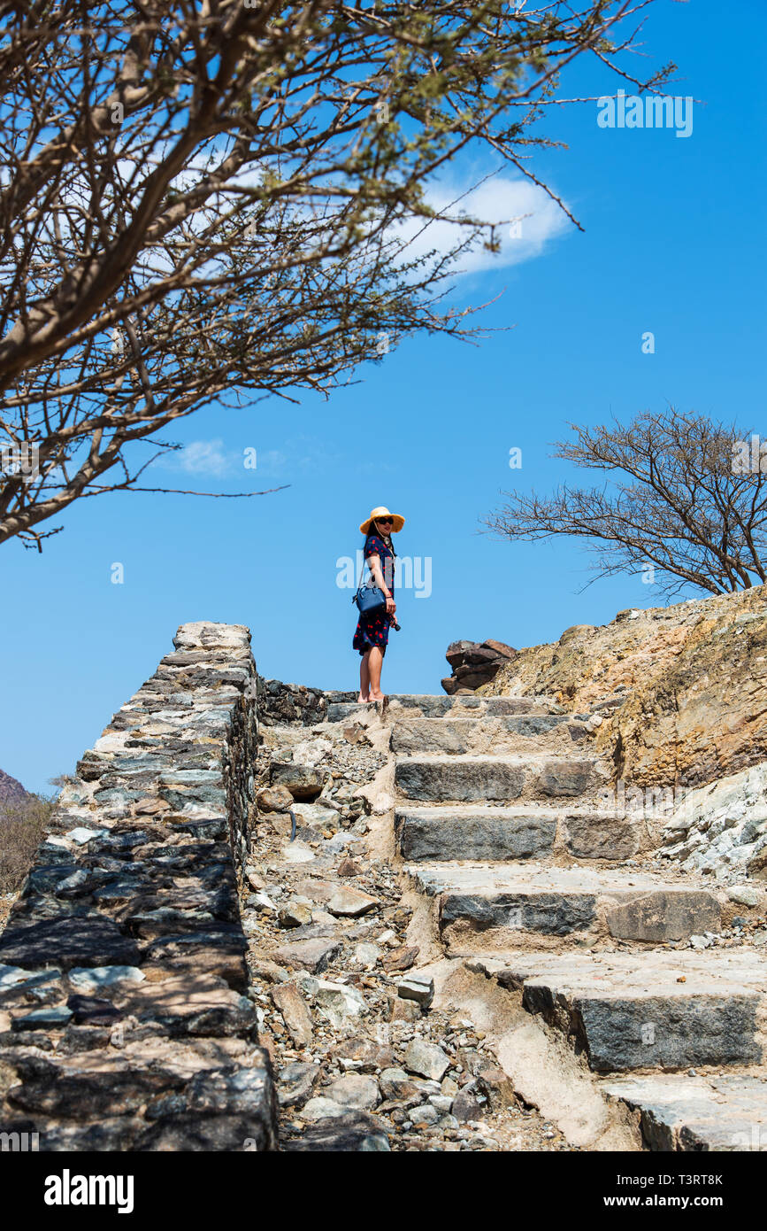 Woman climbing stairs hi-res stock photography and images - Alamy