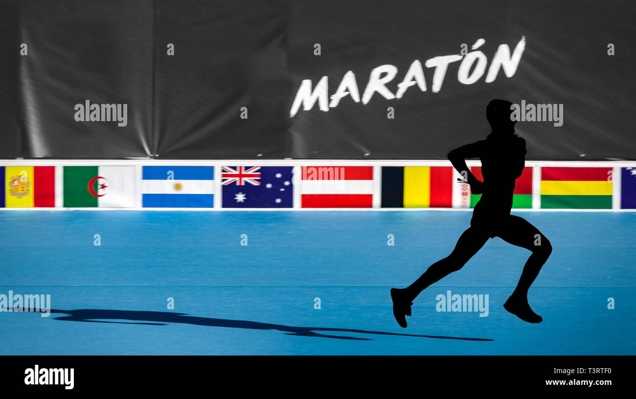 Fast marathon runner silhouette with blurred background Stock Photo - Alamy