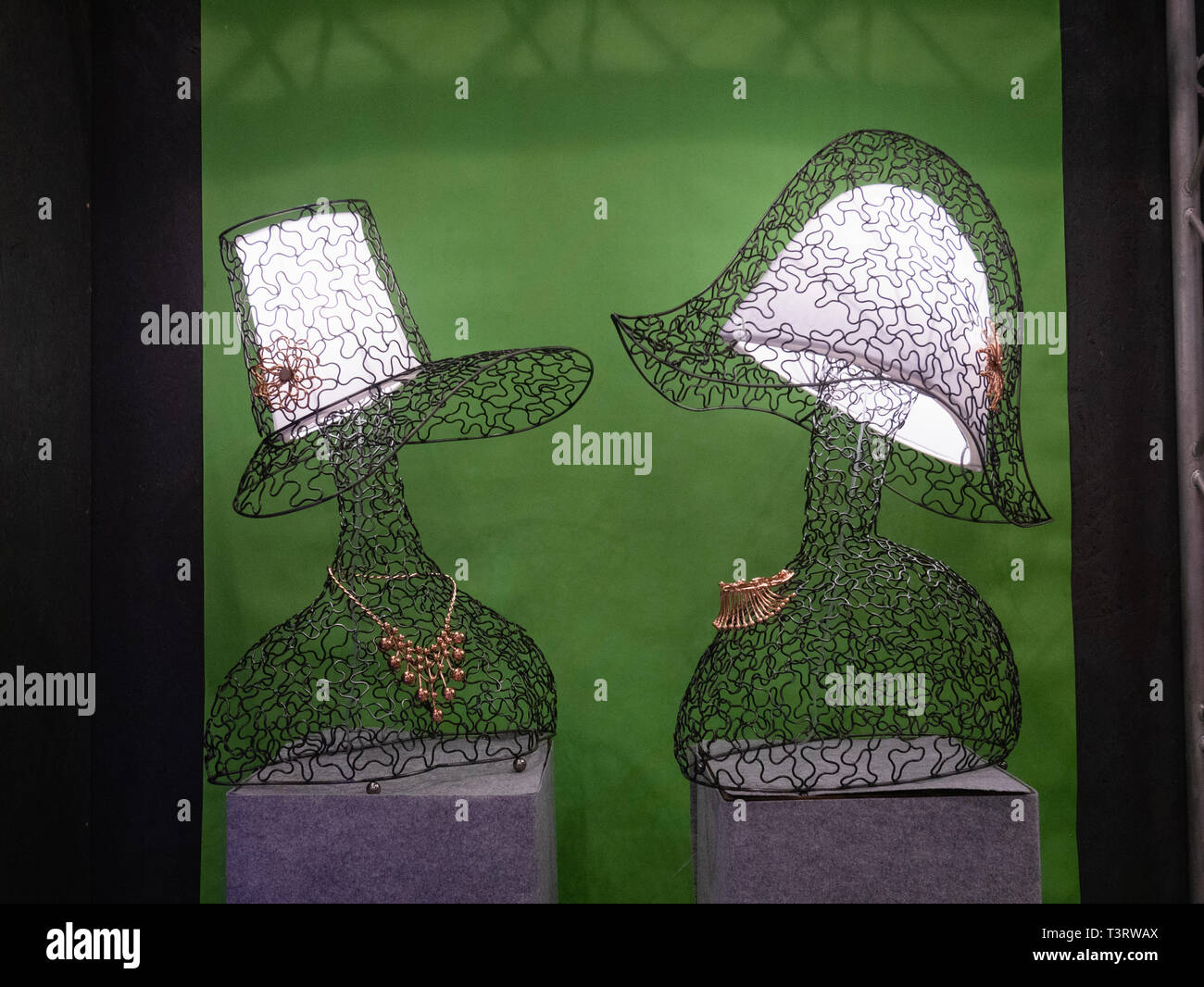 two table lamps in shape of woman portrait in classic hat made of wire ...