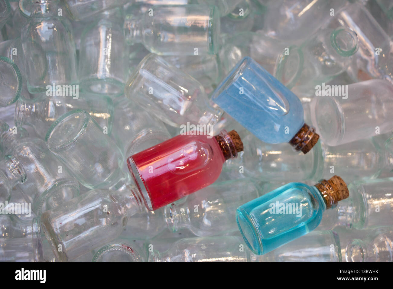 Set of Empty small transparent bottles in a box Stock Photo - Alamy