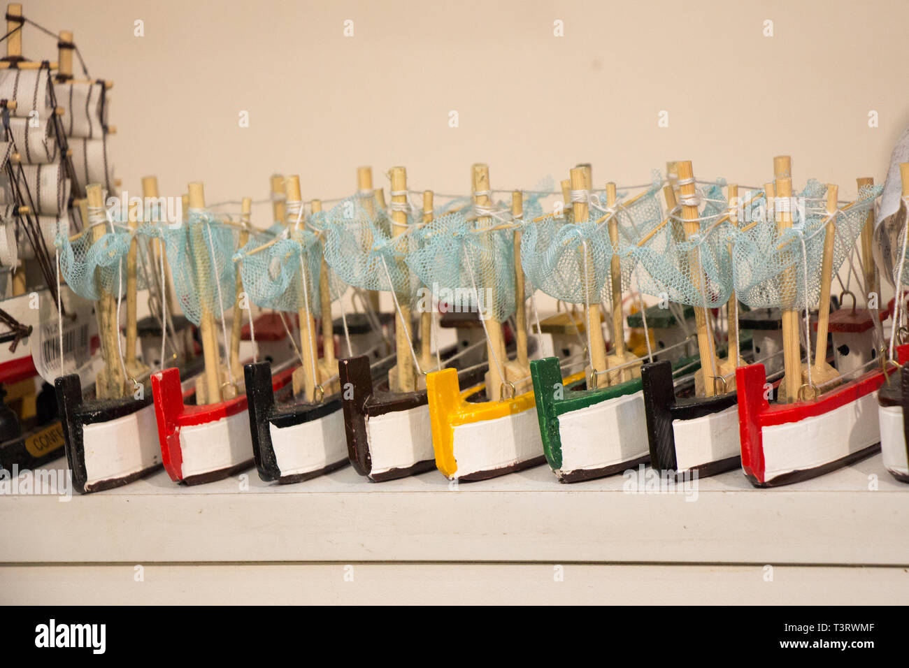 Set of small colorful wooden model boats Stock Photo - Alamy