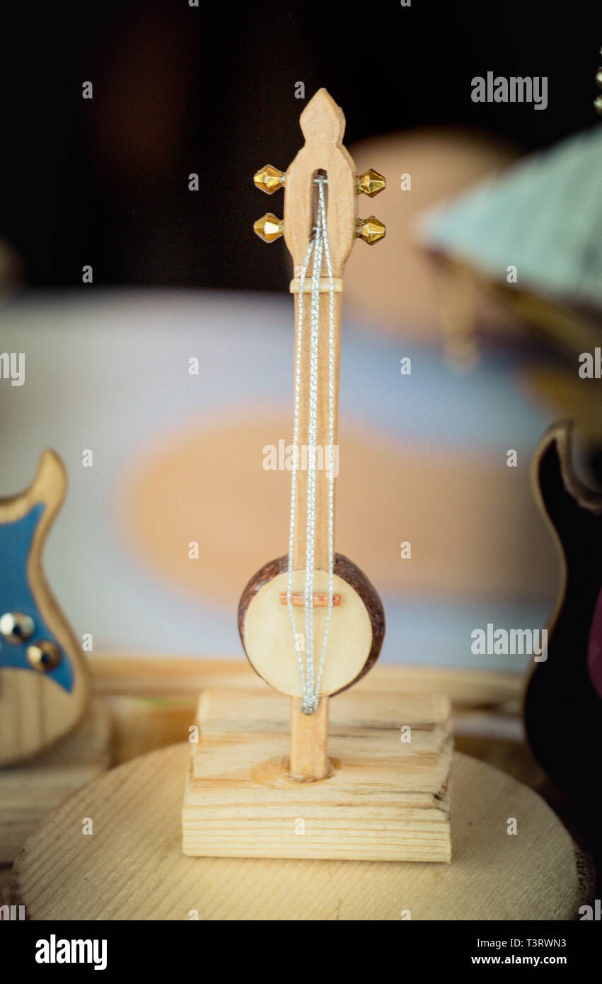 Set of models of musical instruments made of wood Stock Photo - Alamy