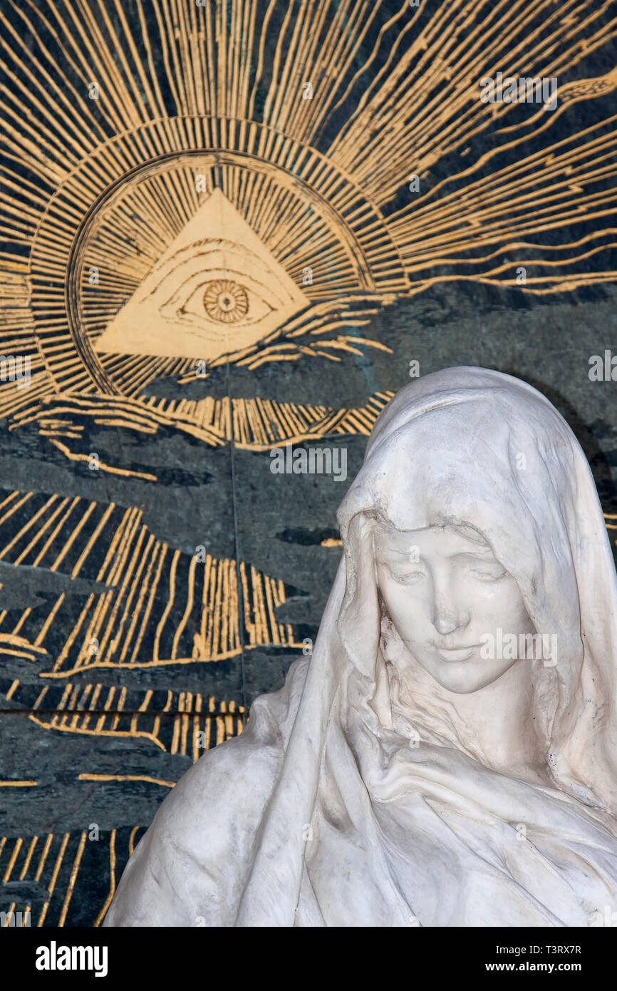 Woman sculpture in front of coffin, in the background God's eye, former ...