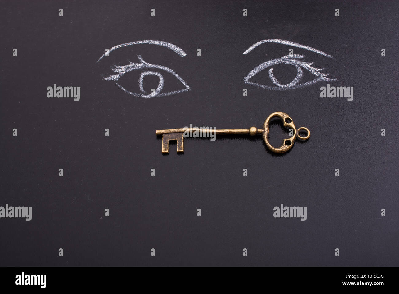 Retro styled golden color key forms the word key Stock Photo - Alamy