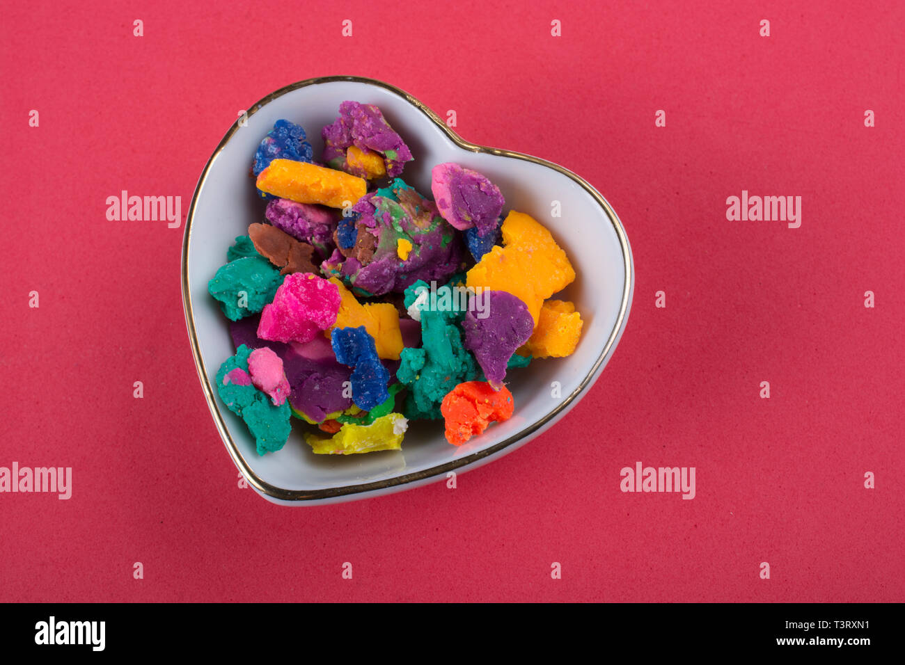 Dry colorful play dough in smal pieces Stock Photo - Alamy