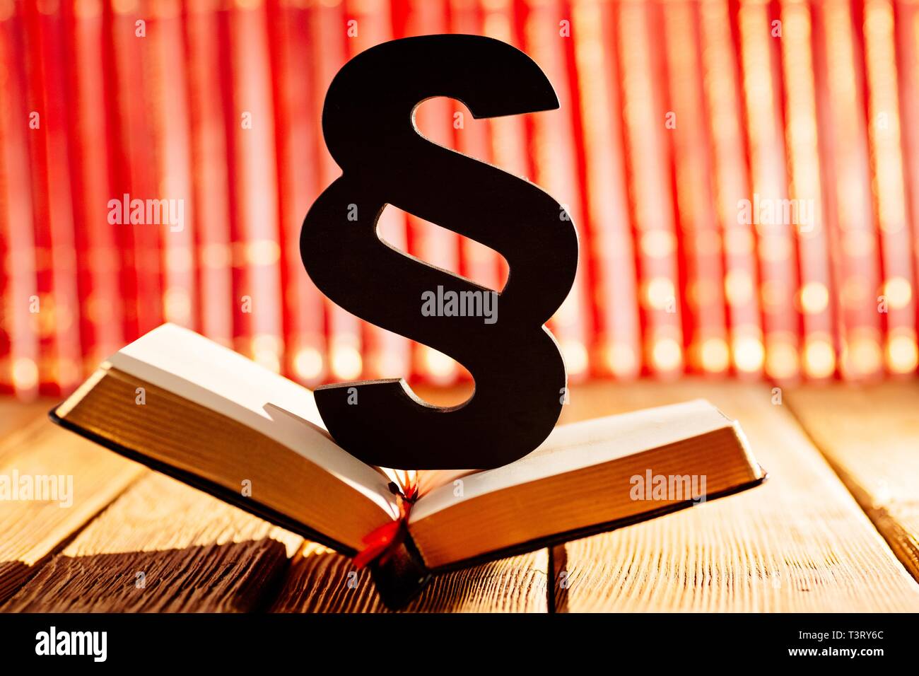 Wooden paragraph symbol of law and legal code Stock Photo - Alamy