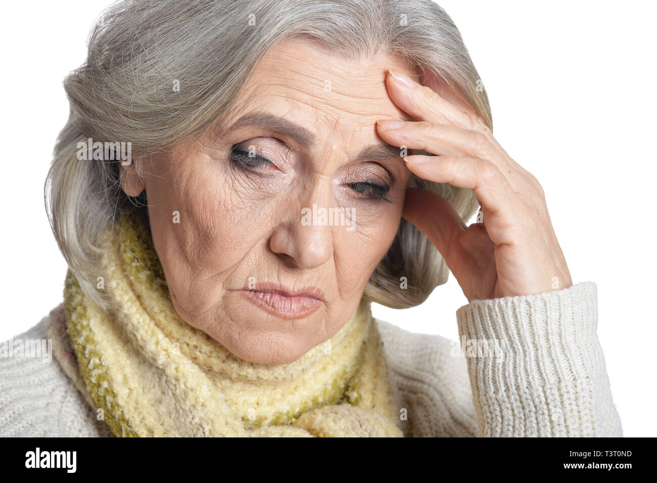 Sad senior woman posing isolated on white background Stock Photo - Alamy