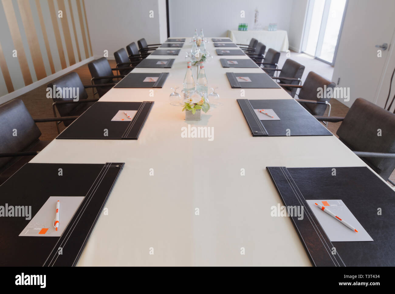 Empty table in office meeting room Stock Photo - Alamy