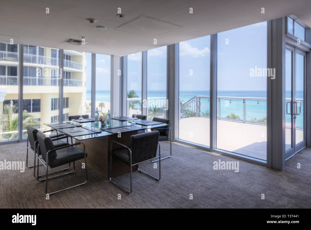 Empty table in office meeting room Stock Photo - Alamy
