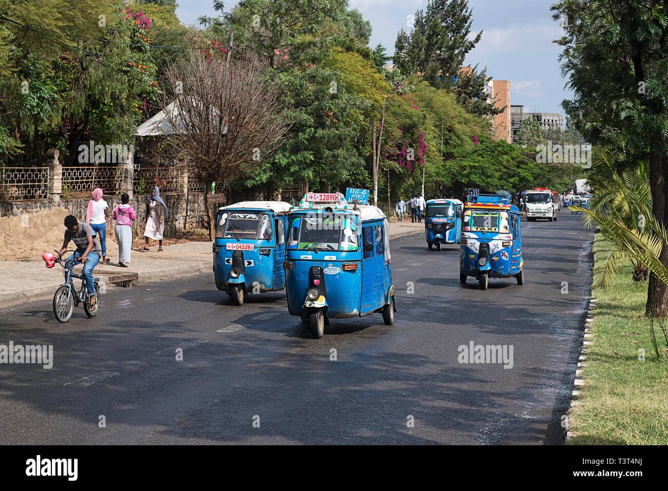 Tuk-Tuks driving on the road, Axum, Tigray, Ethiopia Stock Photo - Alamy
