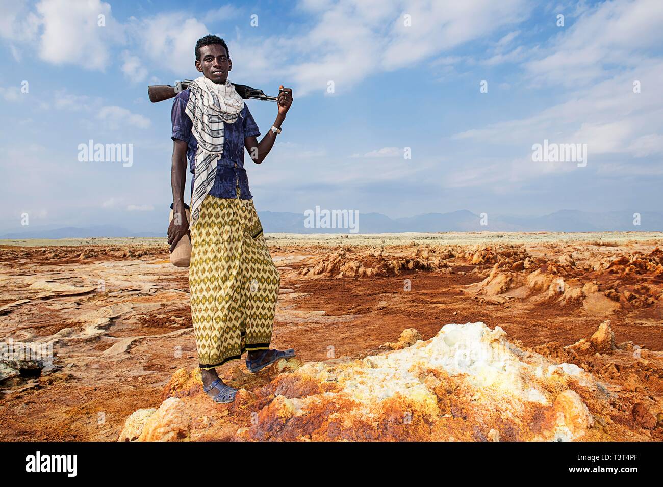 Afar nomad with Kalashnikov, Daloll geothermal area, Danakil valley ...