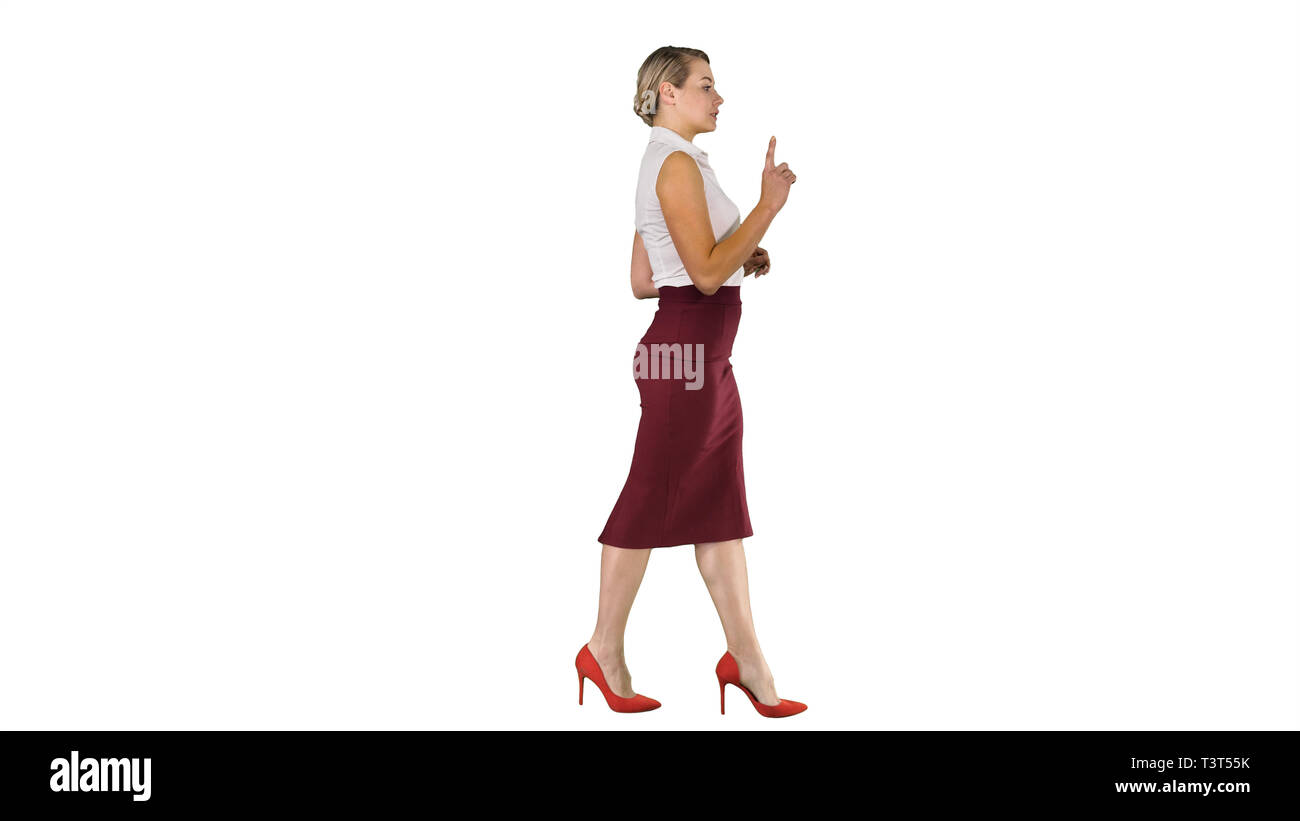 Beautiful Woman Talking And Walking on white background Stock Photo - Alamy