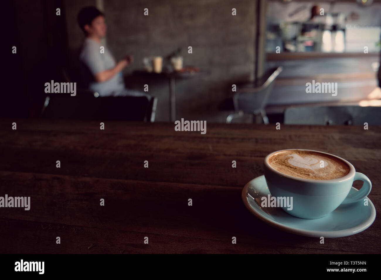 cup of coffee on table in cafe - vintage style effect picture Stock ...