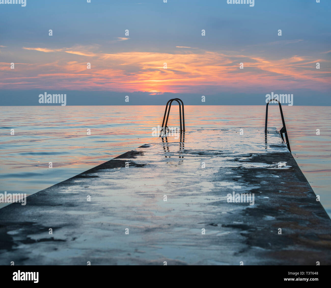 Sunset at a pier in central Visby, Gotland, Sweden. Scandinavia Stock ...