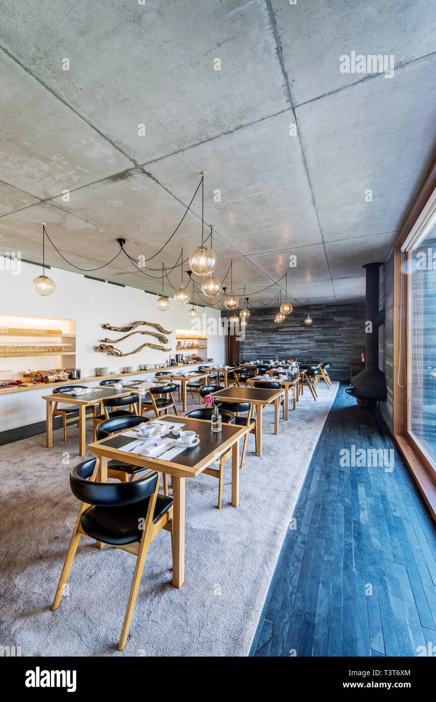 Tables and chairs in modern cafe Stock Photo - Alamy