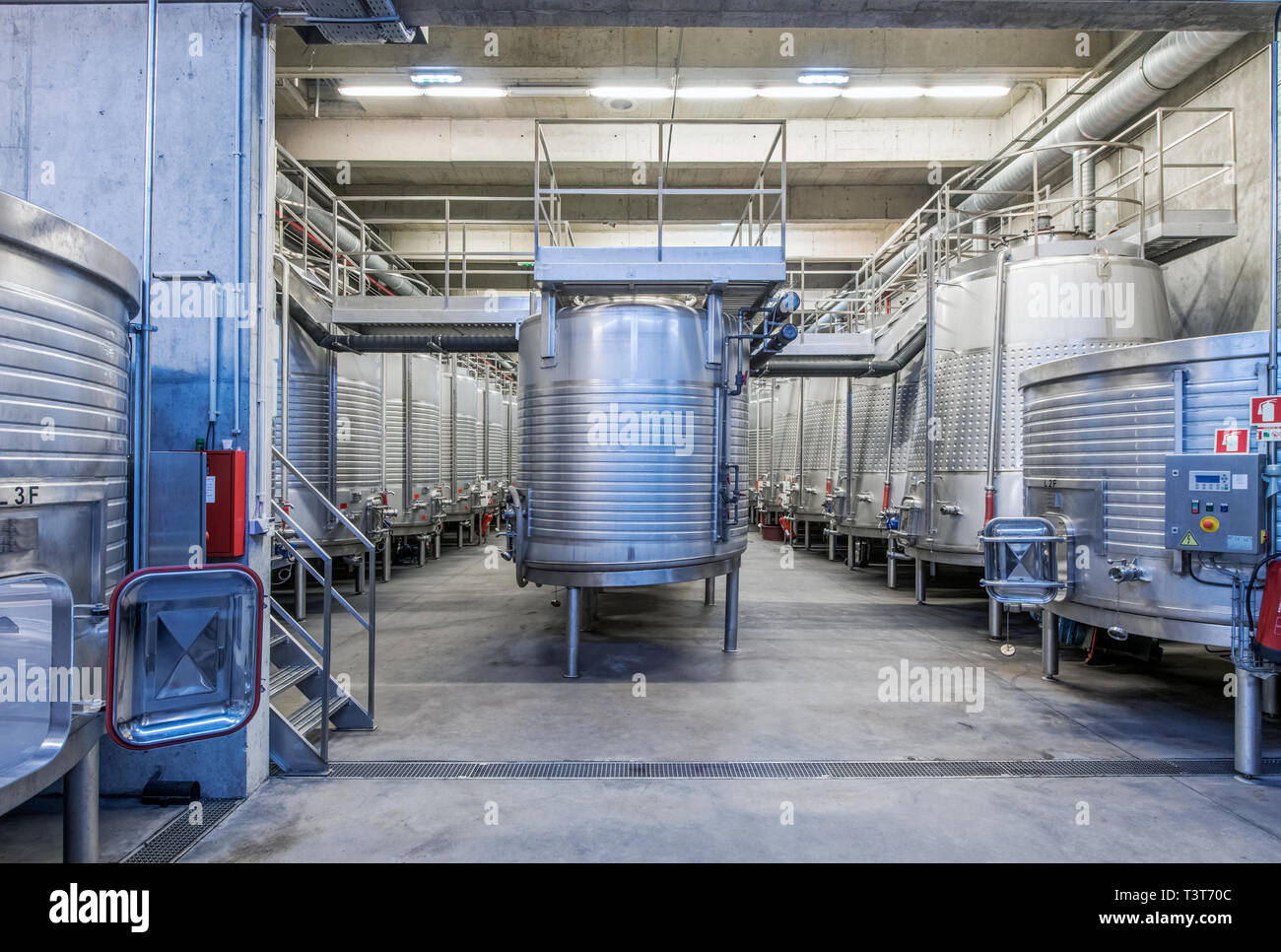 Vats in wine processing plant Stock Photo - Alamy