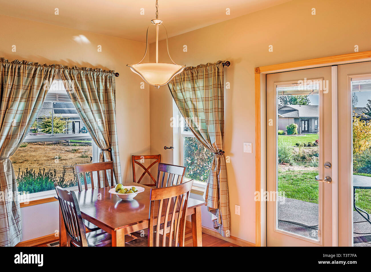 Table and windows in dining room Stock Photo - Alamy