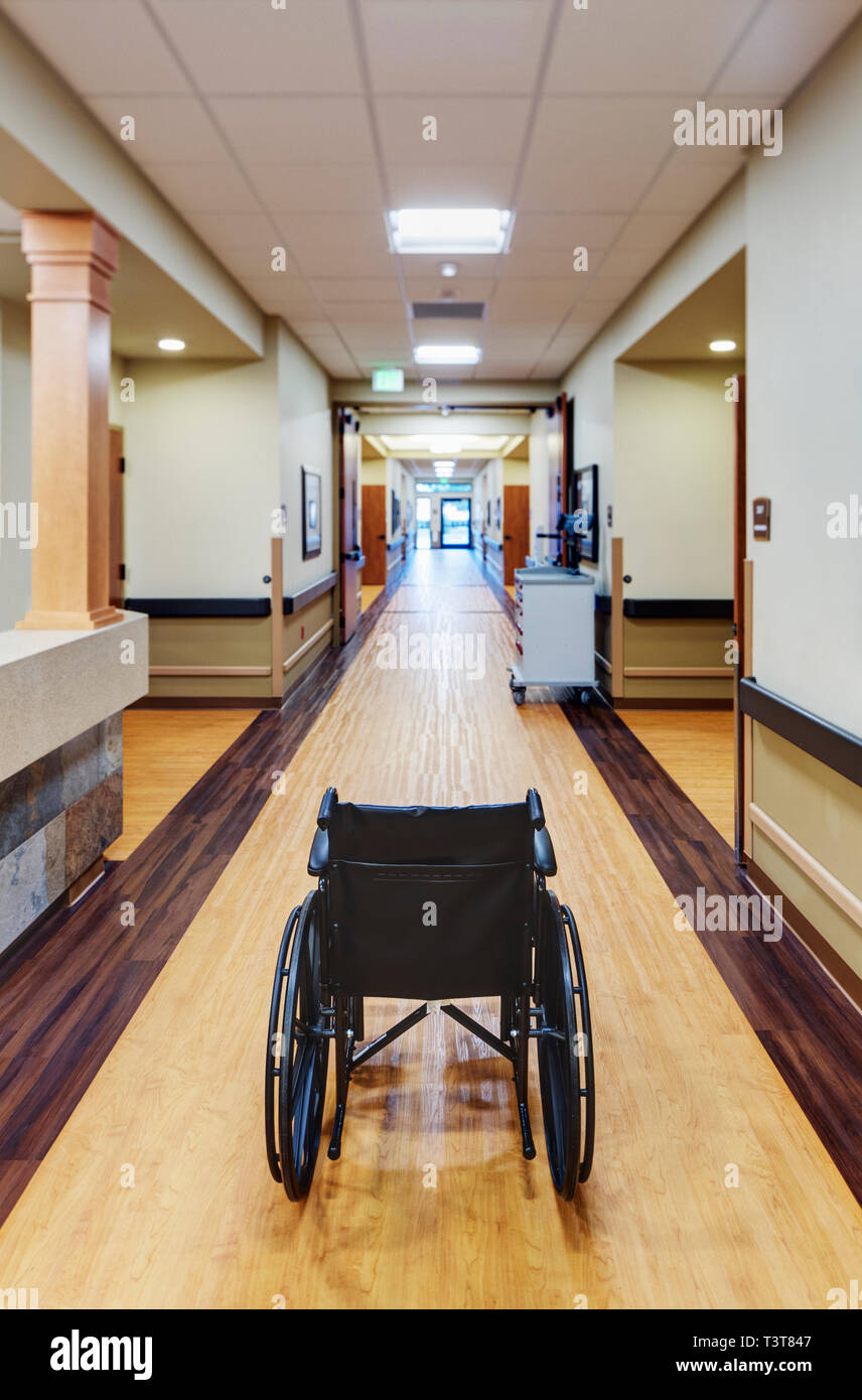 Empty wheelchair in assisted living facility Stock Photo - Alamy