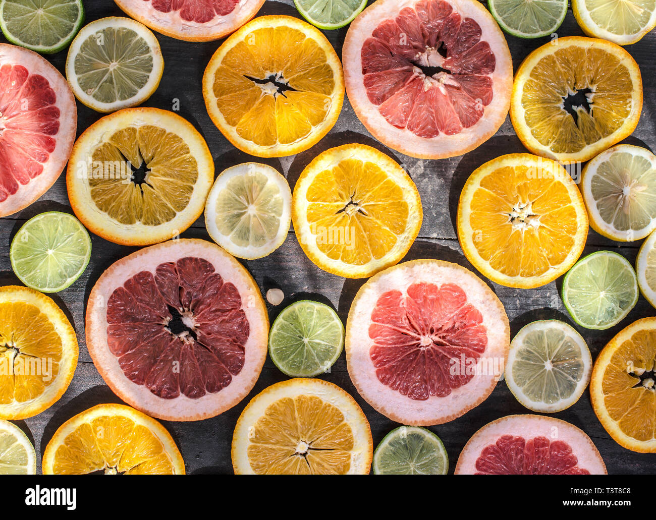 Variety of citrus fruit slices Stock Photo - Alamy