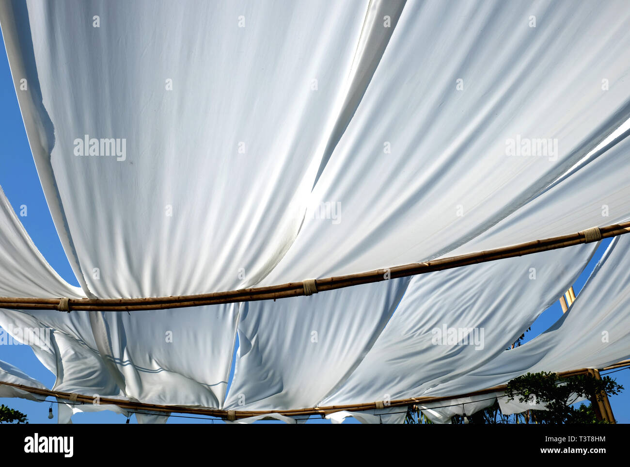 white white fabric texture wind blowing background, texture of flying ...