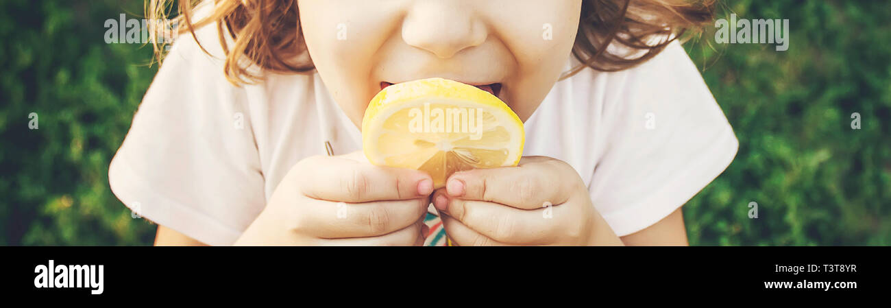 Sour lemon child hi-res stock photography and images - Alamy