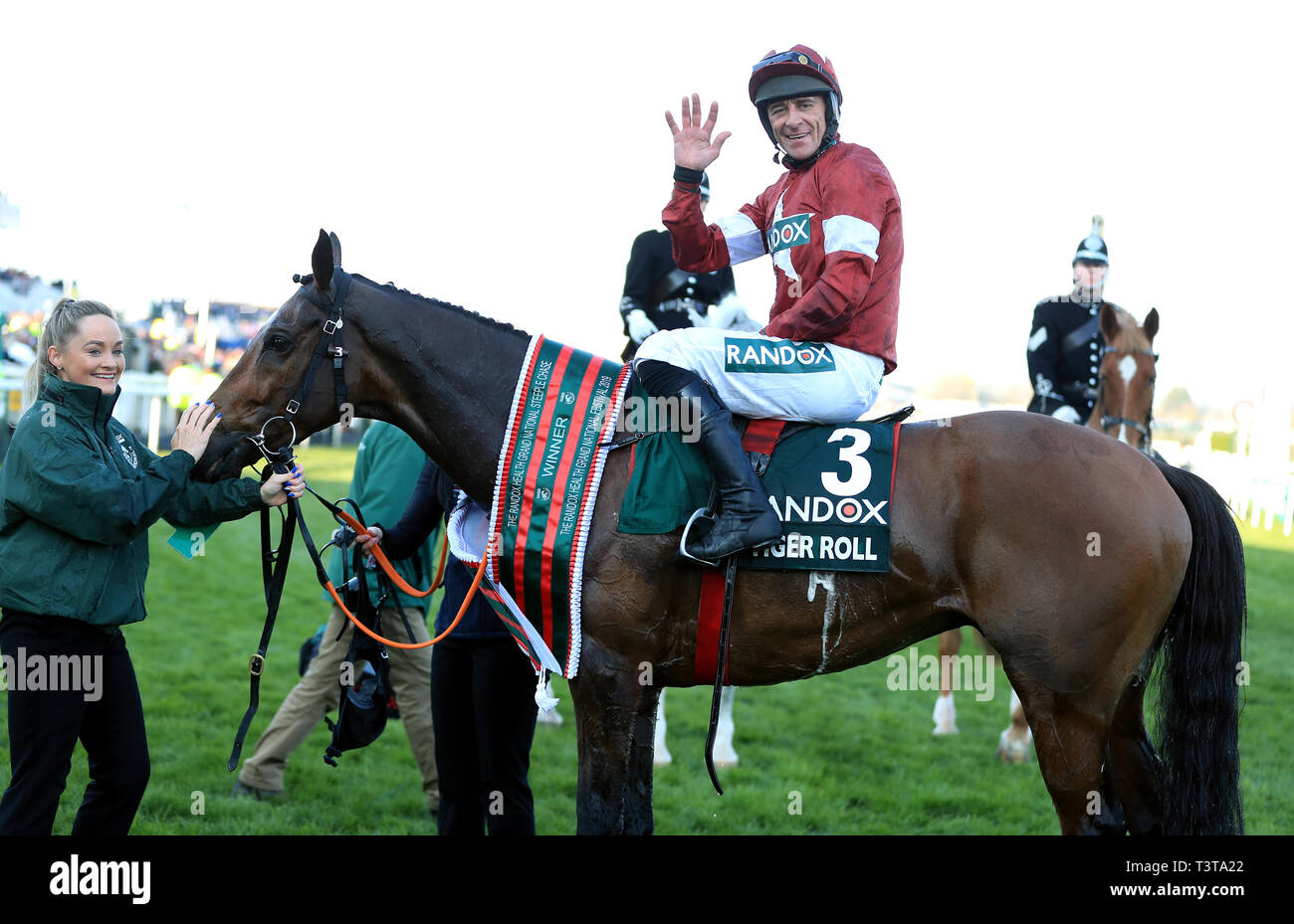 Jockey Davy Russell celebrates winning the Randox Health Grand National ...