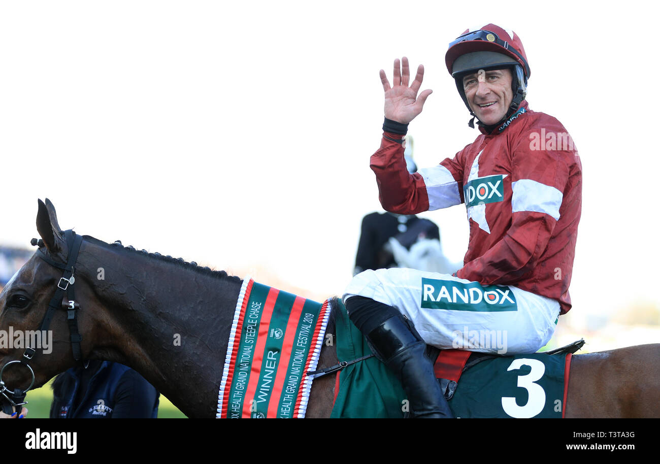 Jockey Davy Russell celebrates winning the Randox Health Grand National ...