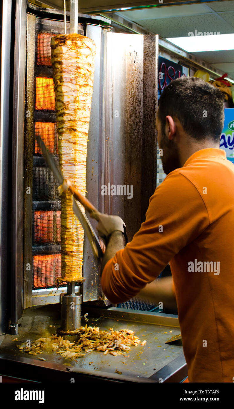 Istanbul, Turkey, March 08, 2019: worker at fast food restaurant ...