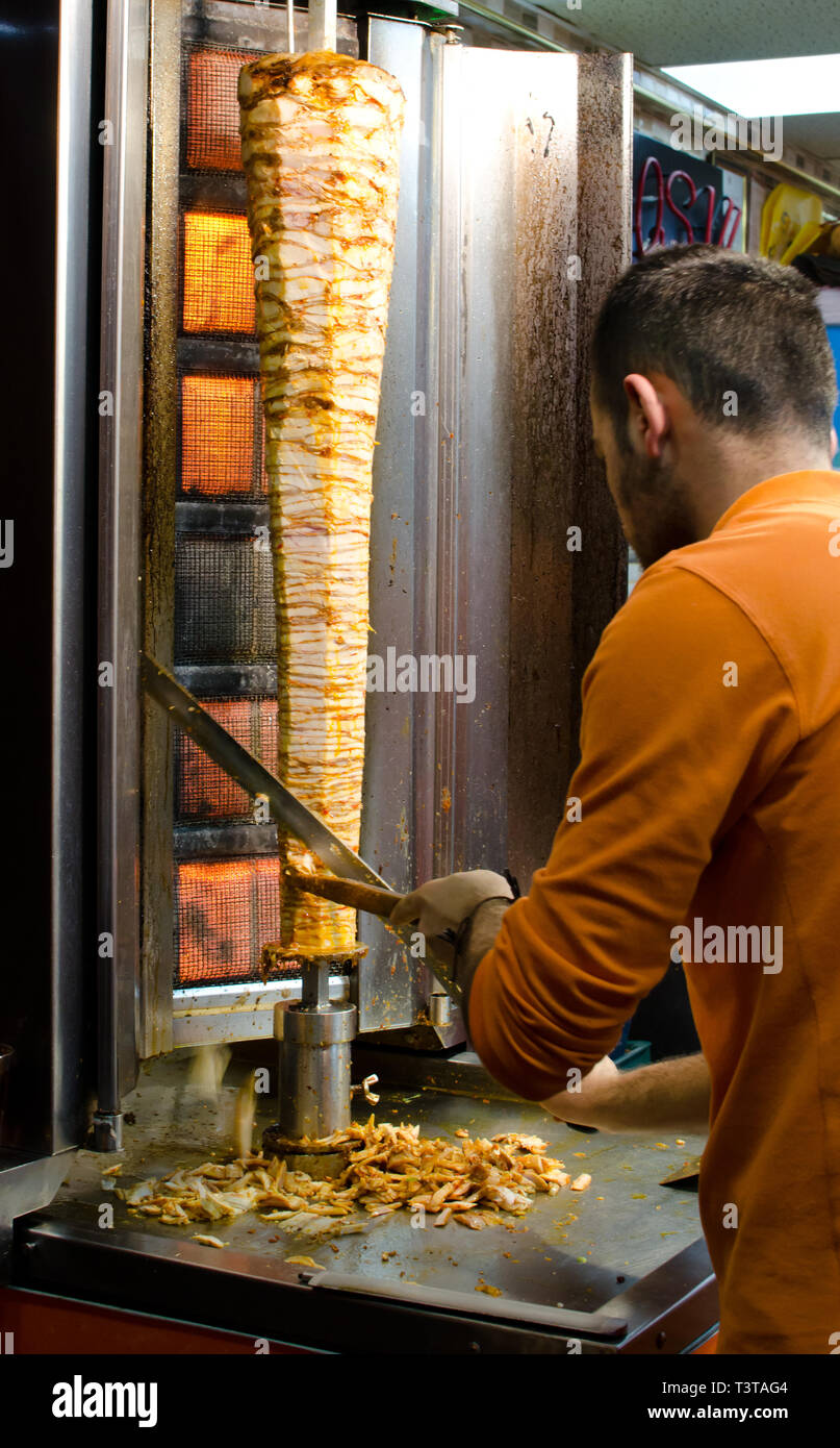 Istanbul, Turkey, March 08, 2019: worker at fast food restaurant ...