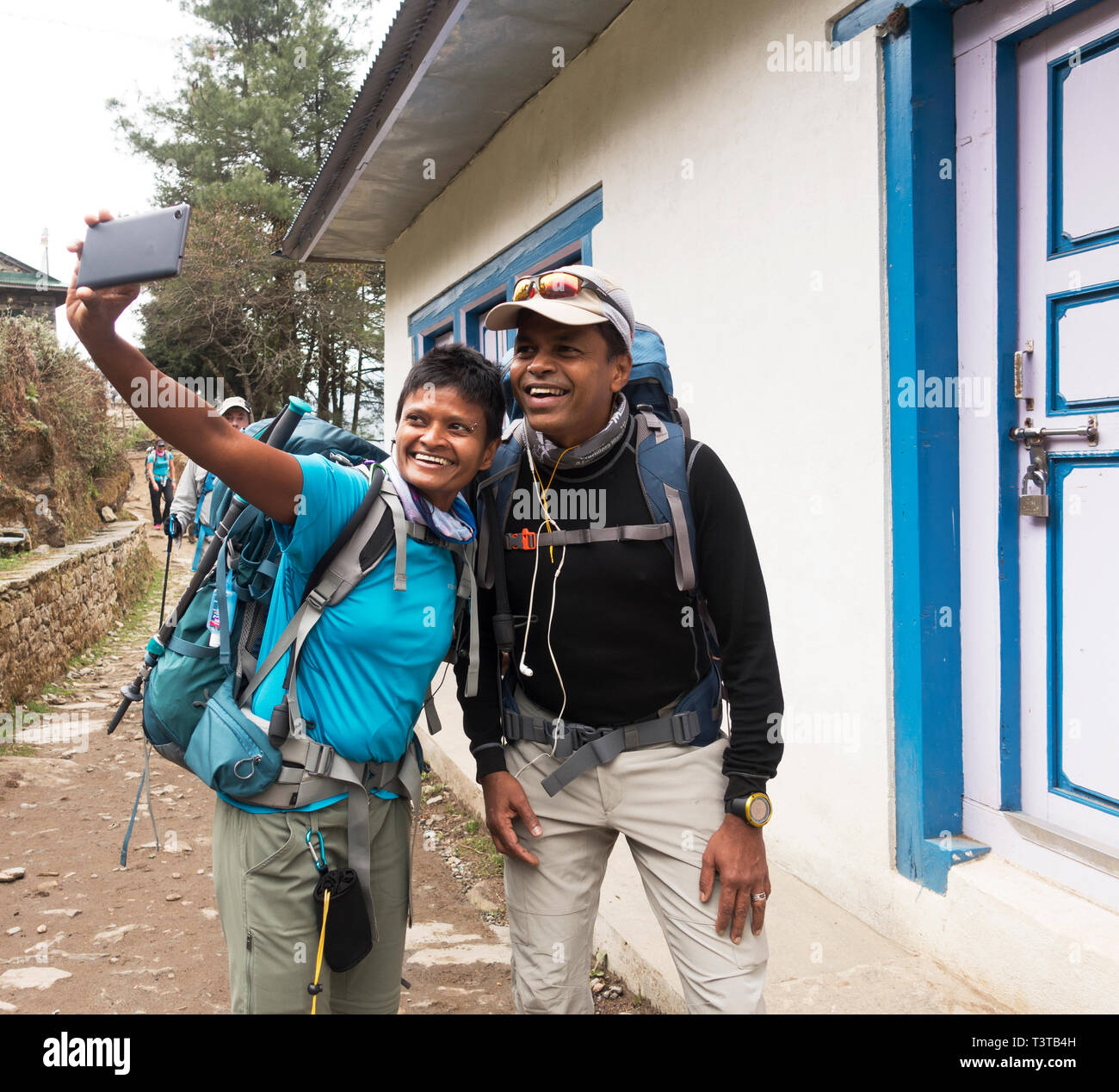 Tourists posing for cell phone selfie Stock Photo - Alamy