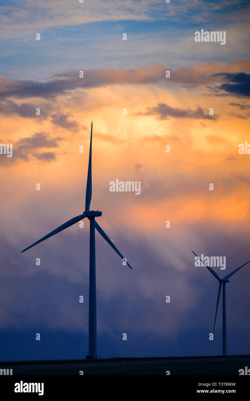 Wind turbines at sunset Stock Photo - Alamy