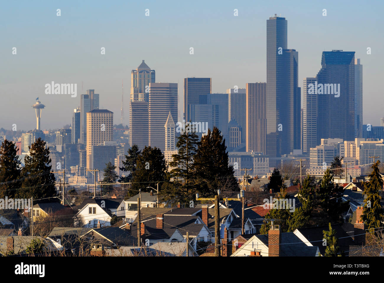 Modern highrises behind houses Stock Photo - Alamy