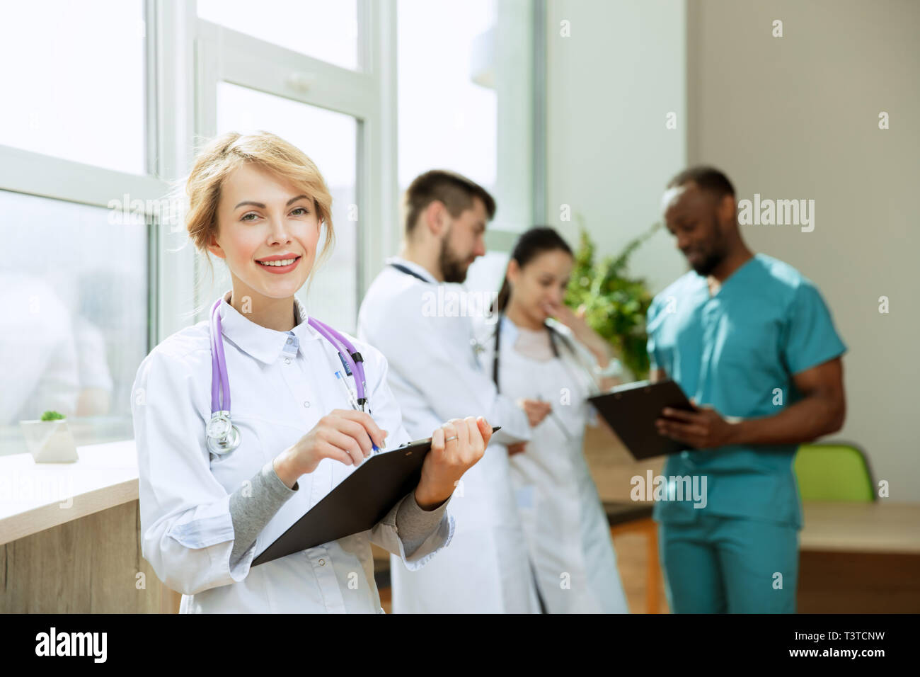 Healthcare people group. Professional female doctor posing at hospital ...
