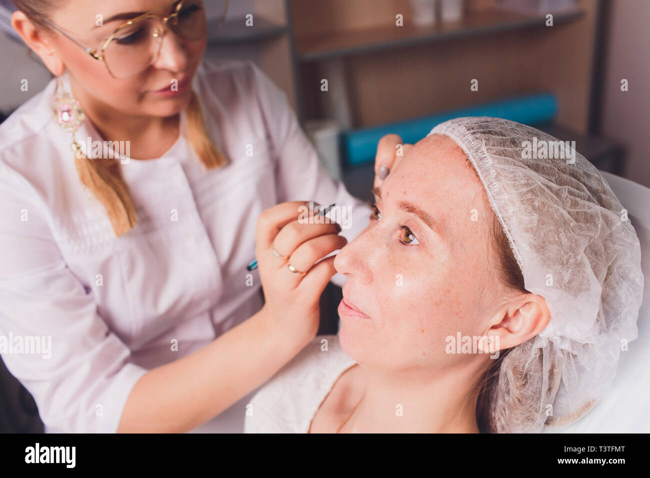 Beauty woman botox injections. Treatment with botox hyaluronic collagen ...