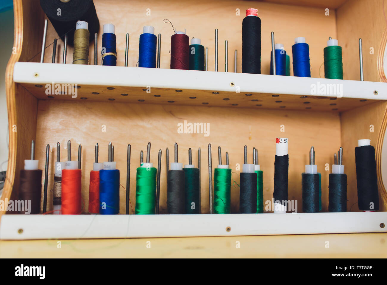 Image of a lot of coils with multi-colored threads Stock Photo - Alamy