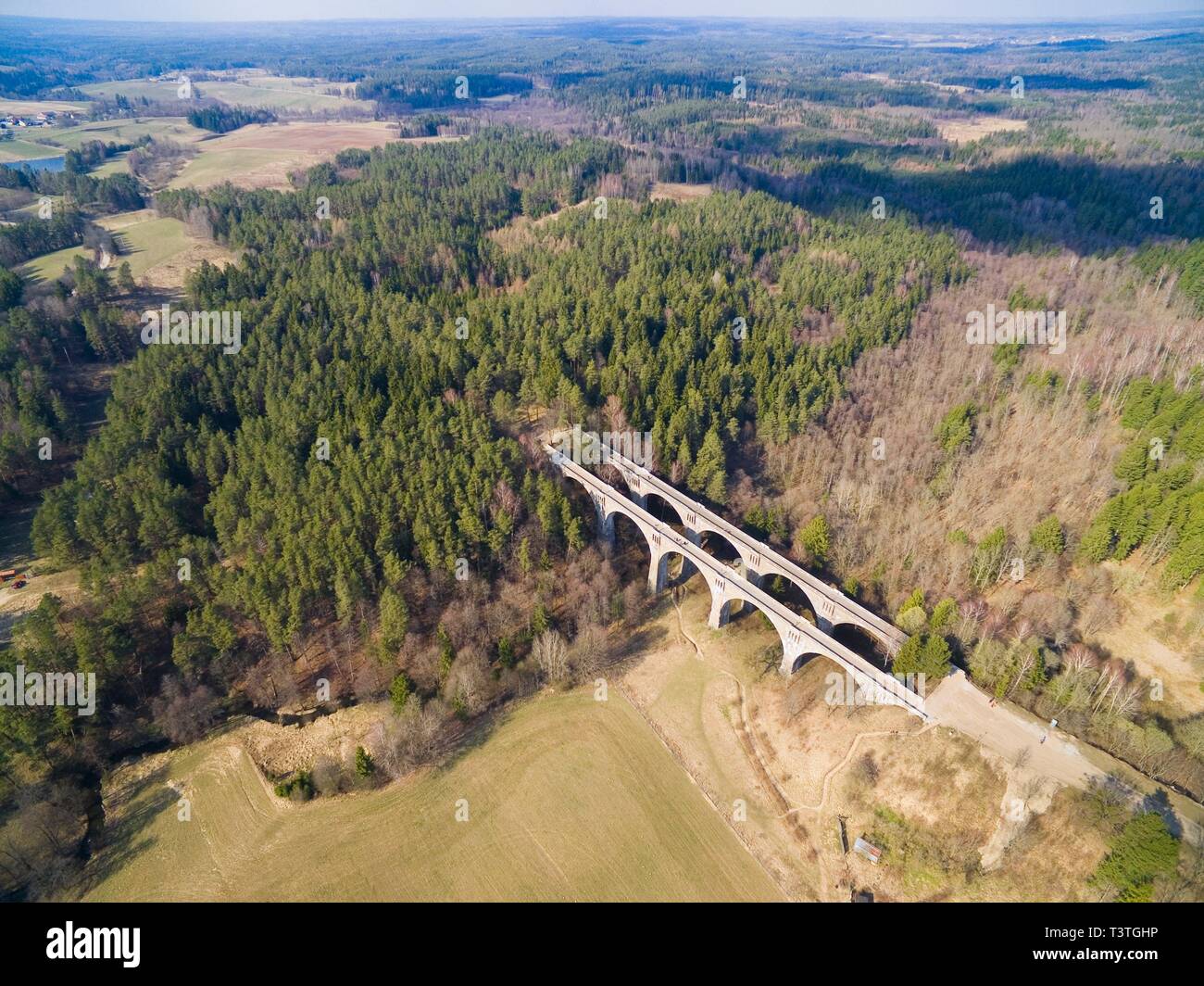 Aerial view of old concrete railway bridges in Stanczyki during spring ...