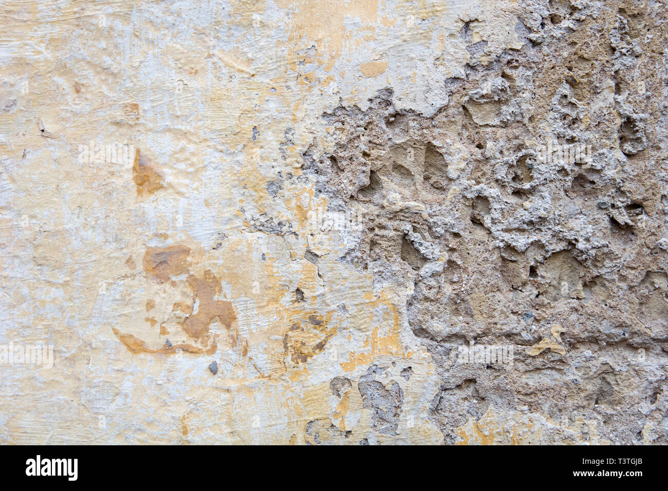 Yellow stone wall texture hi-res stock photography and images - Alamy