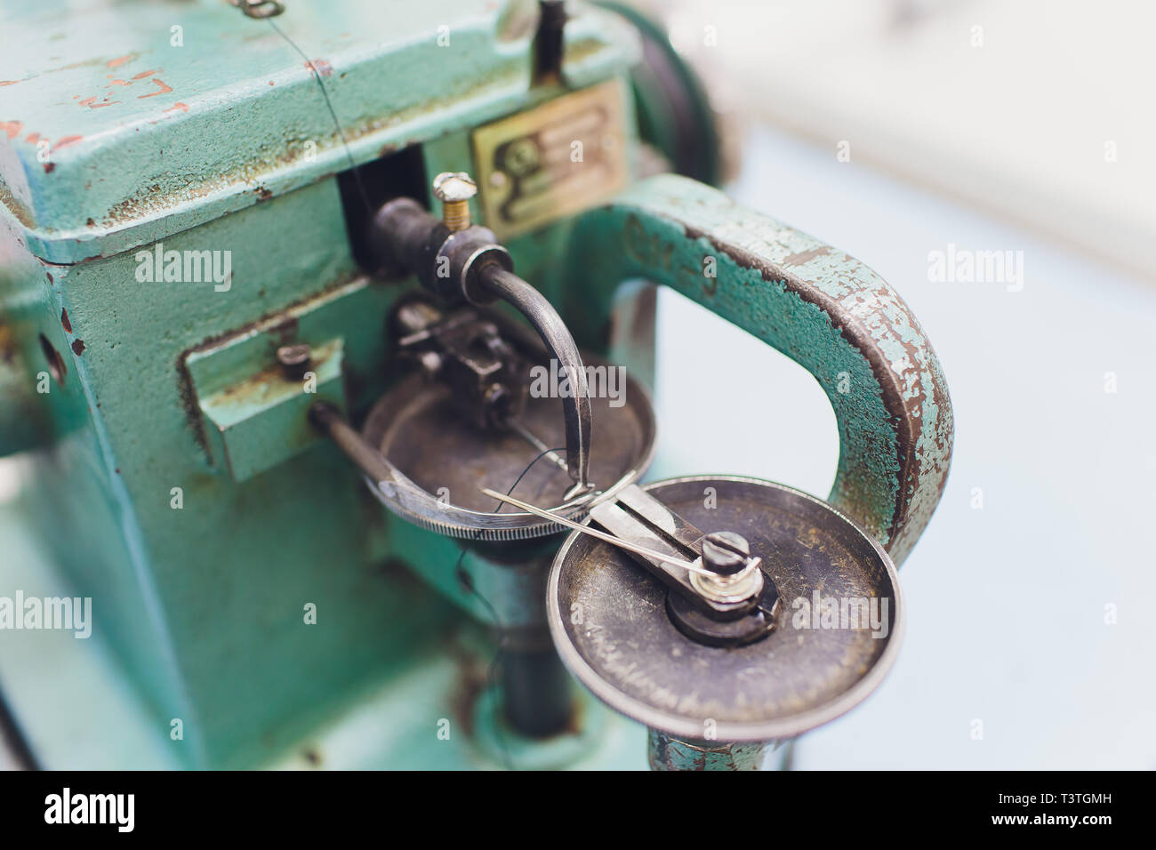 Professional sewing machine on the background of atelier studio ...