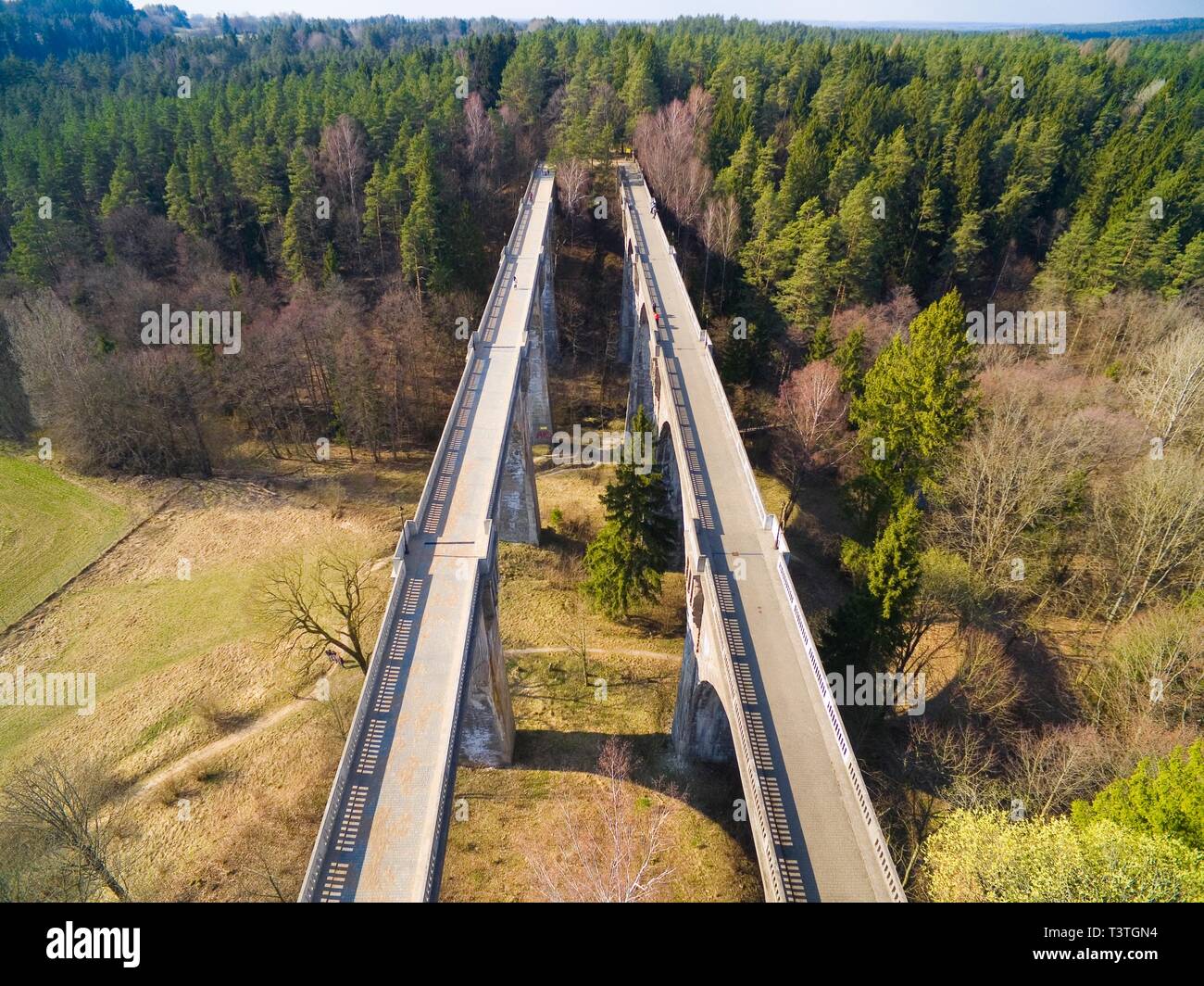Aerial view of old concrete railway bridges in Stanczyki during spring ...