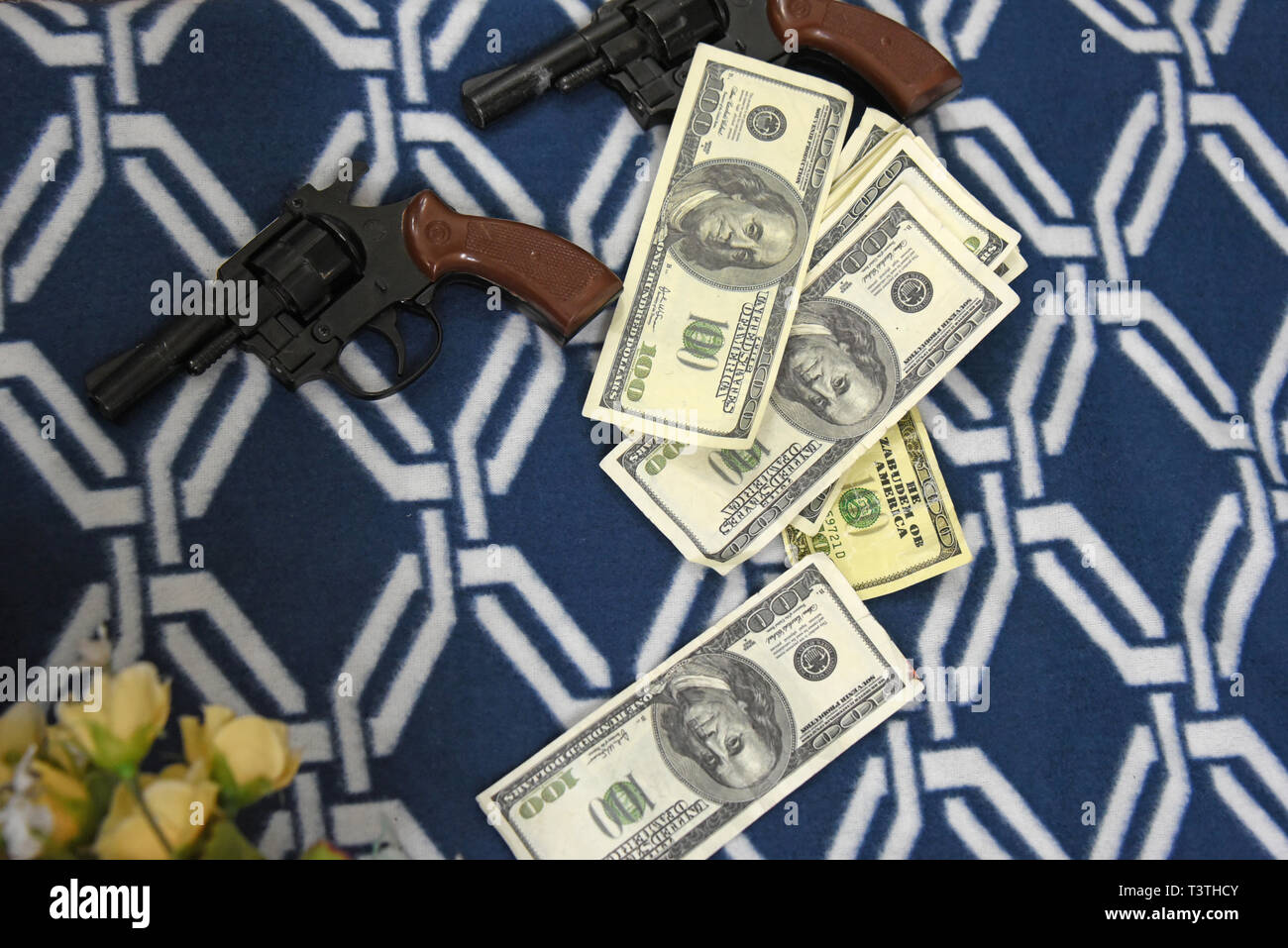 Money And Gun On Lap