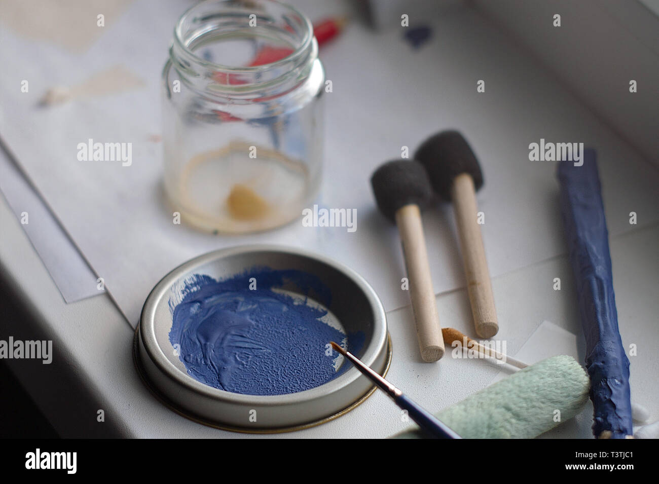 Mixing colors for paintworks, indoor closeup with shallow depth of ...