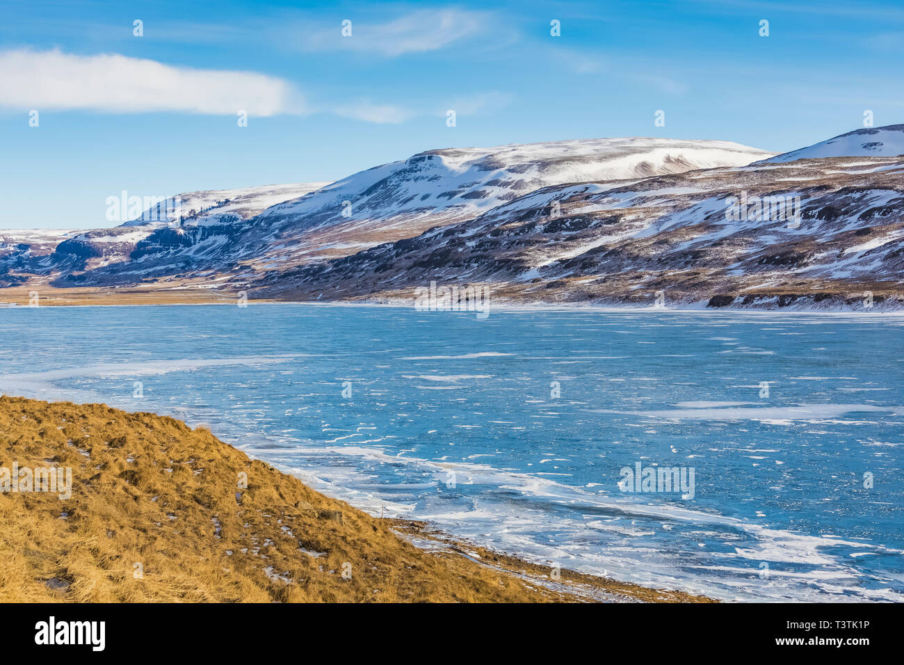Driving Route 60 north along a lake into the Westfjords of Iceland ...
