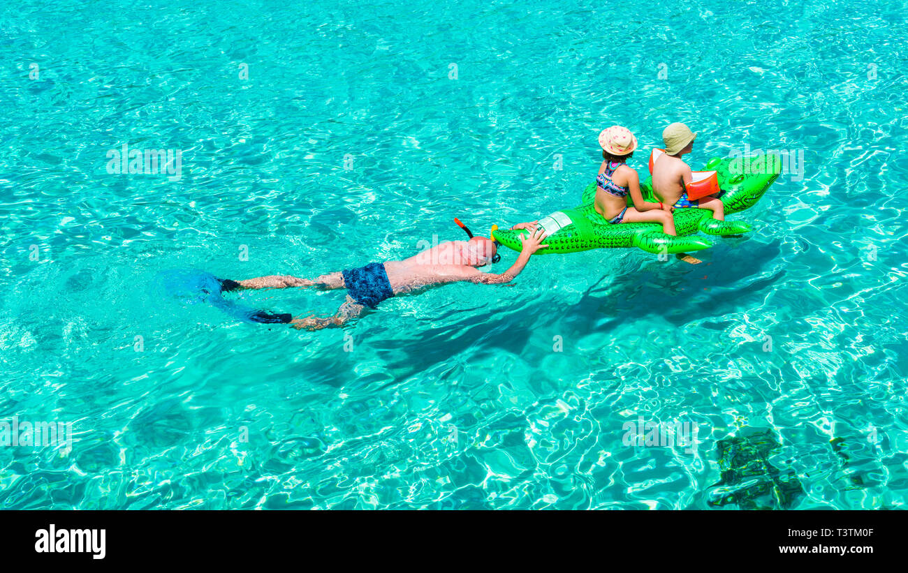 Kids on float hi-res stock photography and images - Alamy