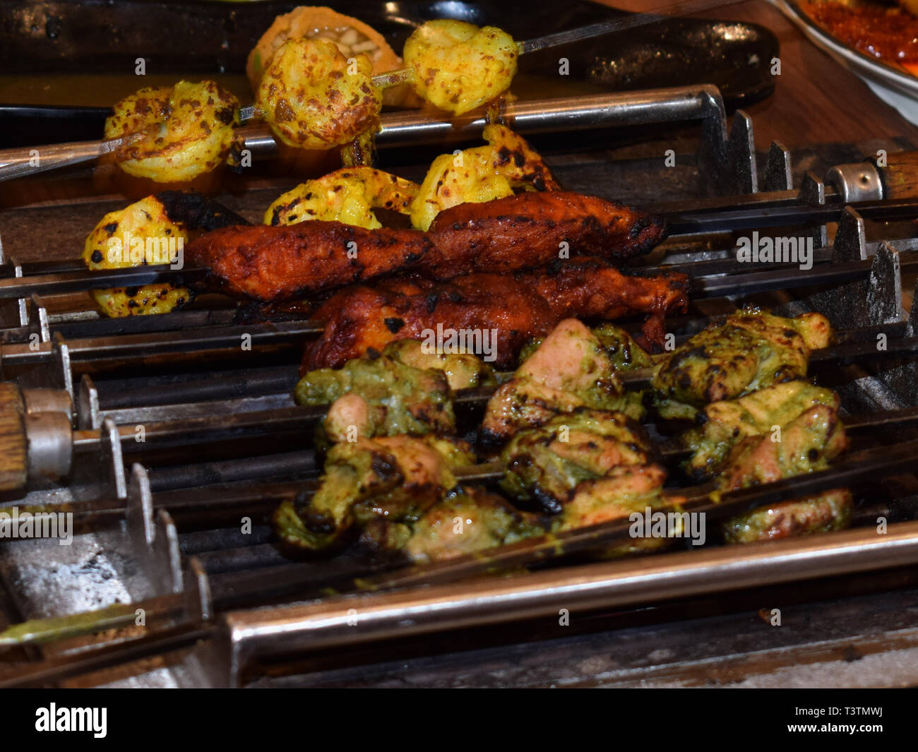 Delicious and spicy Indian Kebabs ( food grilled over burning charcoal ...